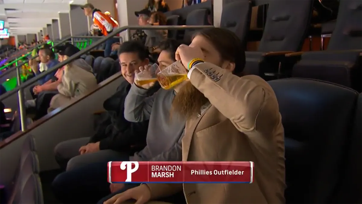 WATCH: Phillies’ Brandon Marsh enters the beer chug pantheon at Flyers ...
